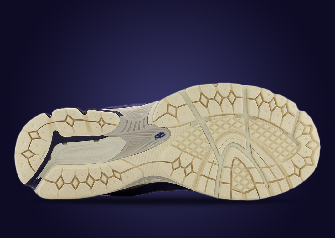 This New Balance 2002R Comes In A Navy Cream Mix - Sneaker News