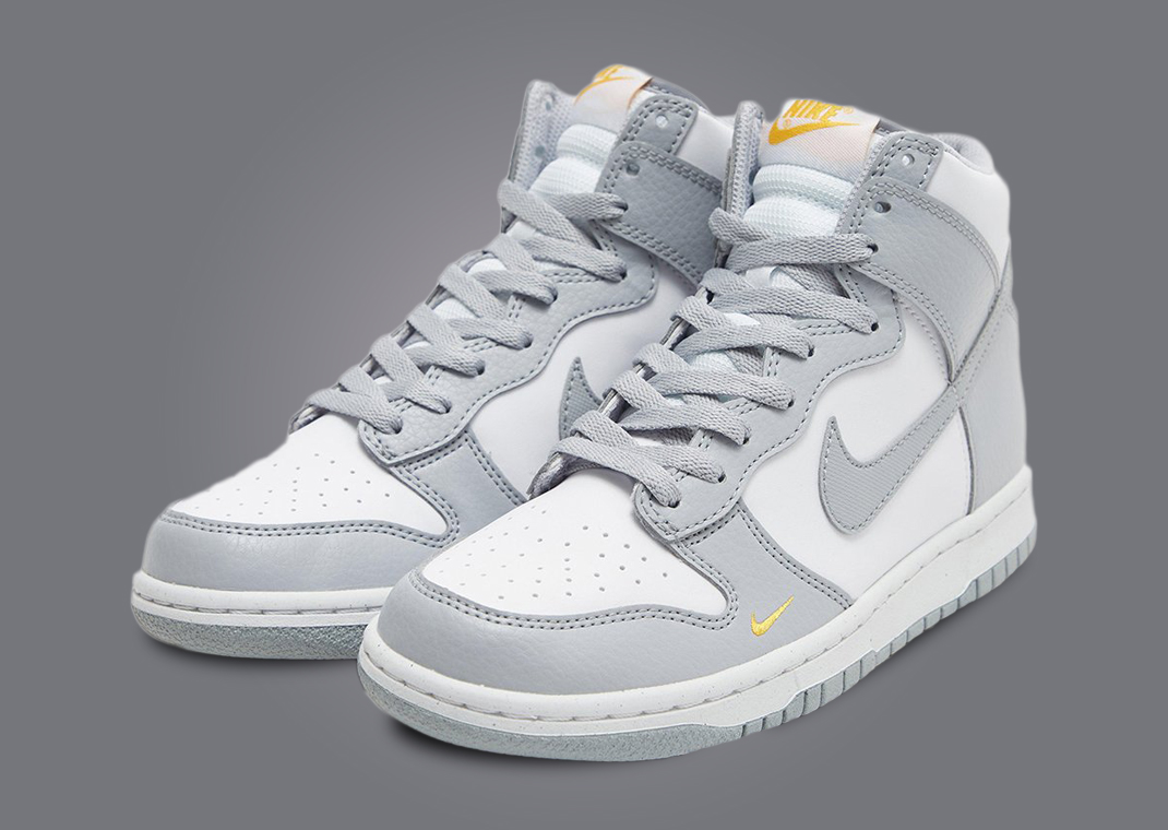 A Mini Swoosh Adorns This Nike Dunk High - Sneaker News