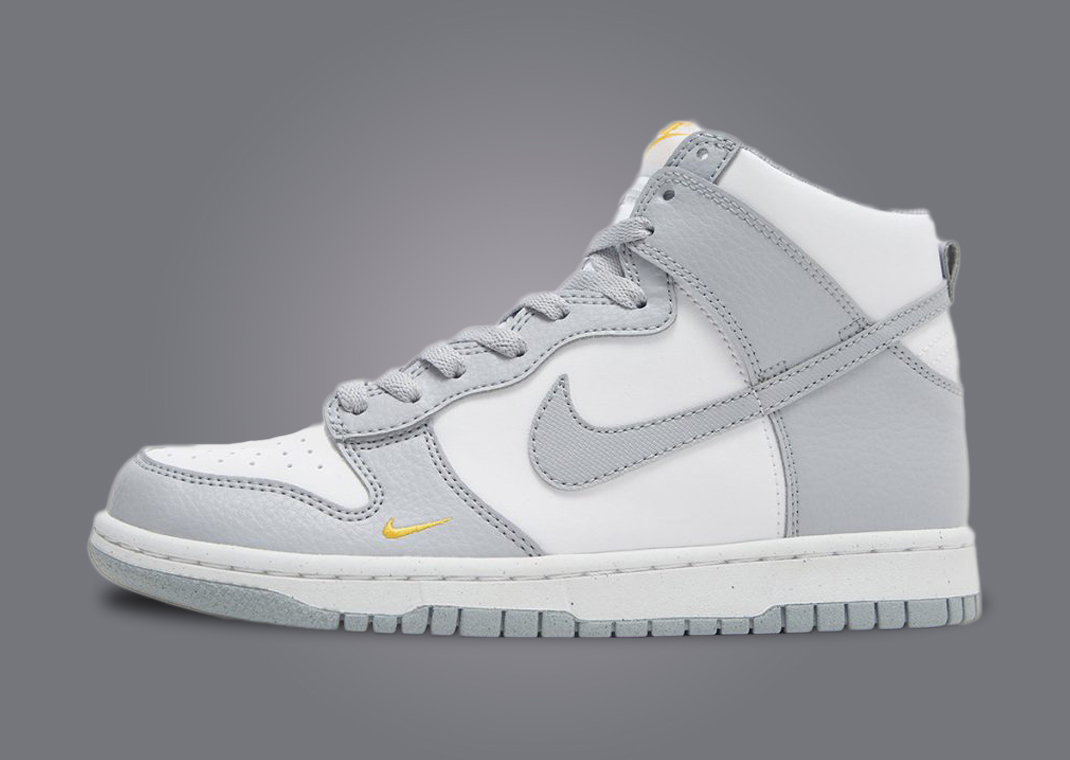 A Mini Swoosh Adorns This Nike Dunk High - Sneaker News