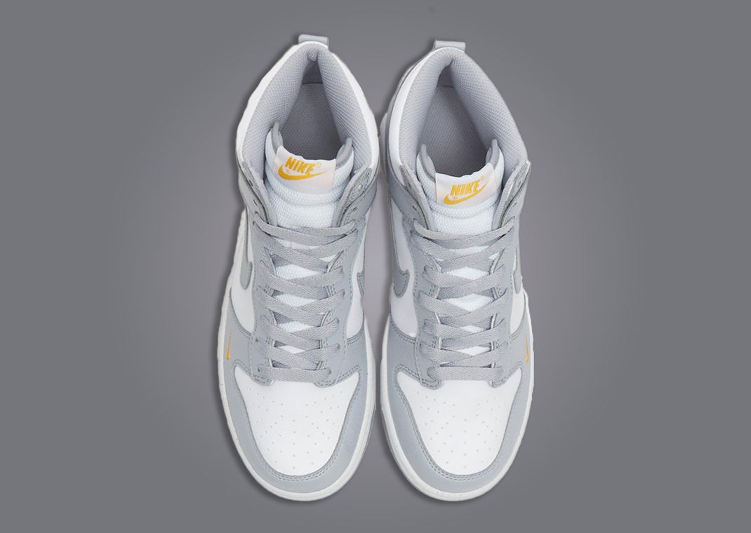 A Mini Swoosh Adorns This Nike Dunk High - Sneaker News