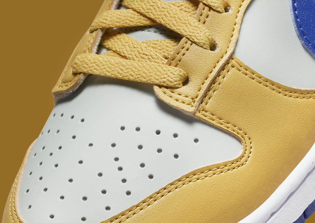 Nike Revisits An Iconic SB Colorway With The Dunk Low Wheat Gold Hyper ...