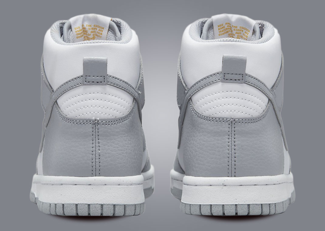 A Mini Swoosh Adorns This Nike Dunk High - Sneaker News