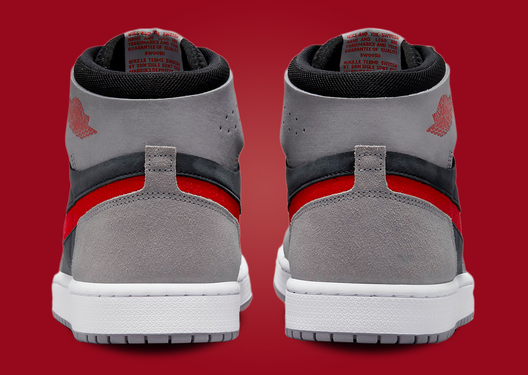 A Combo Of Black, Fire Red, And Cement Grey Cover This Air Jordan 1 ...