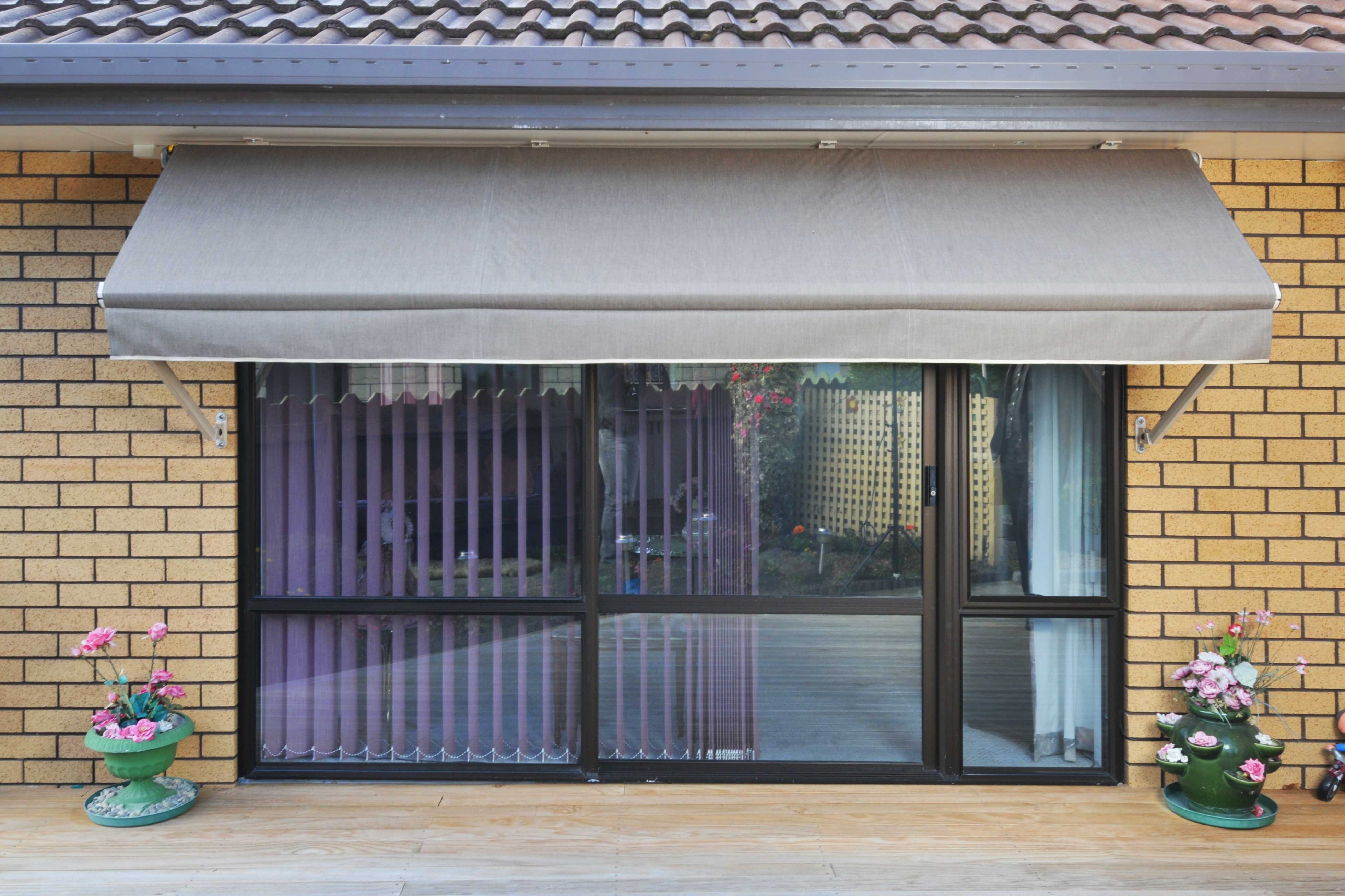 McCraes Spring Arm Awning