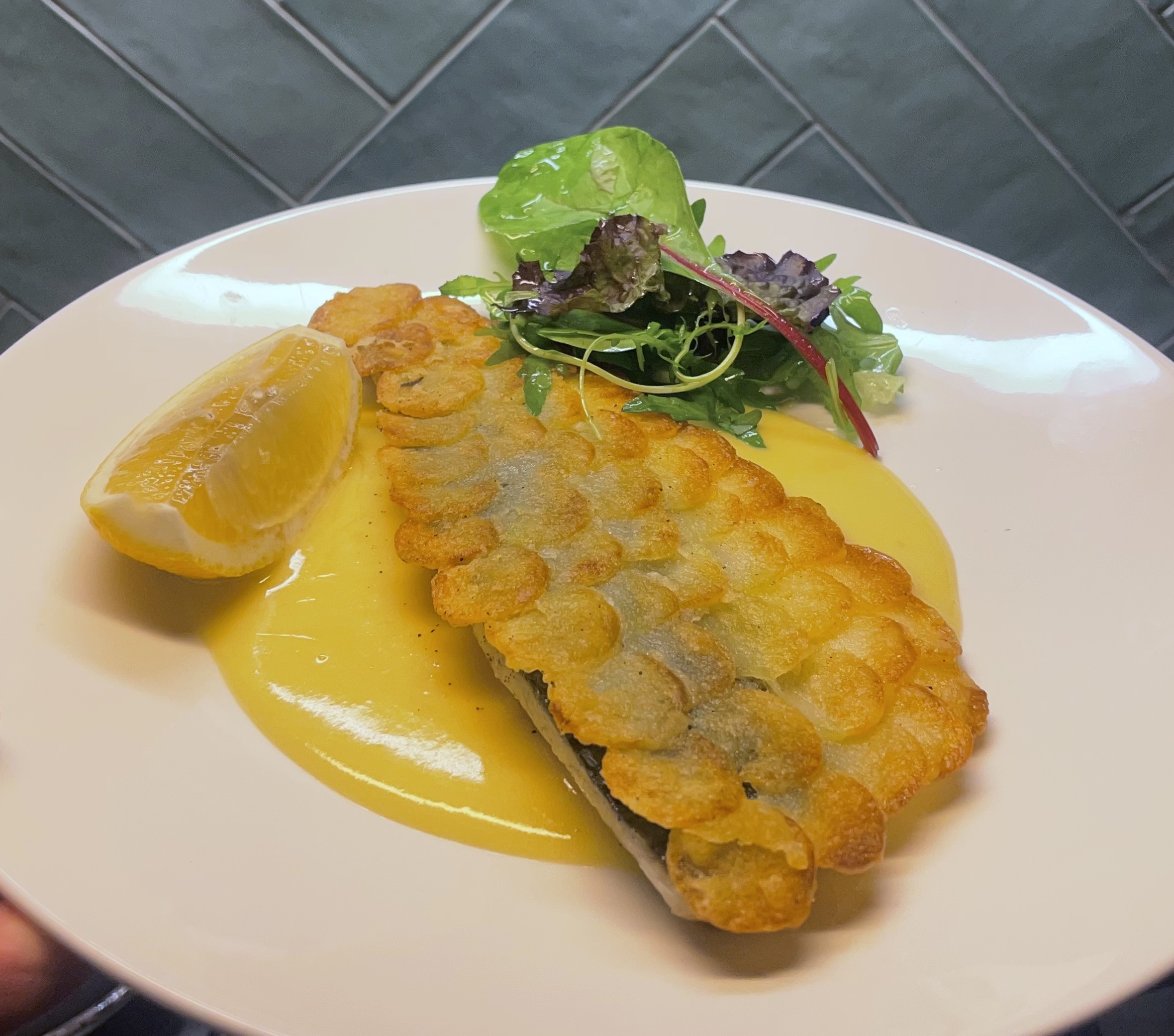 Potato crusted sea-bass & beurre blanc