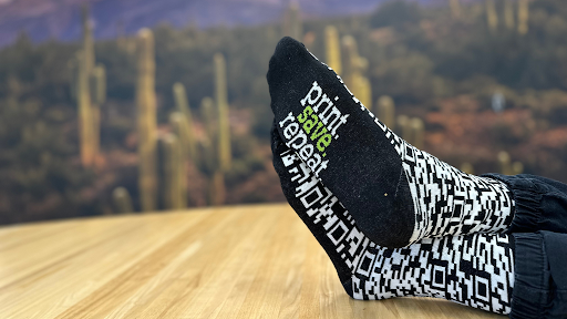 Print.Save.Repeat. Boosts Branding with Custom Barcode Socks