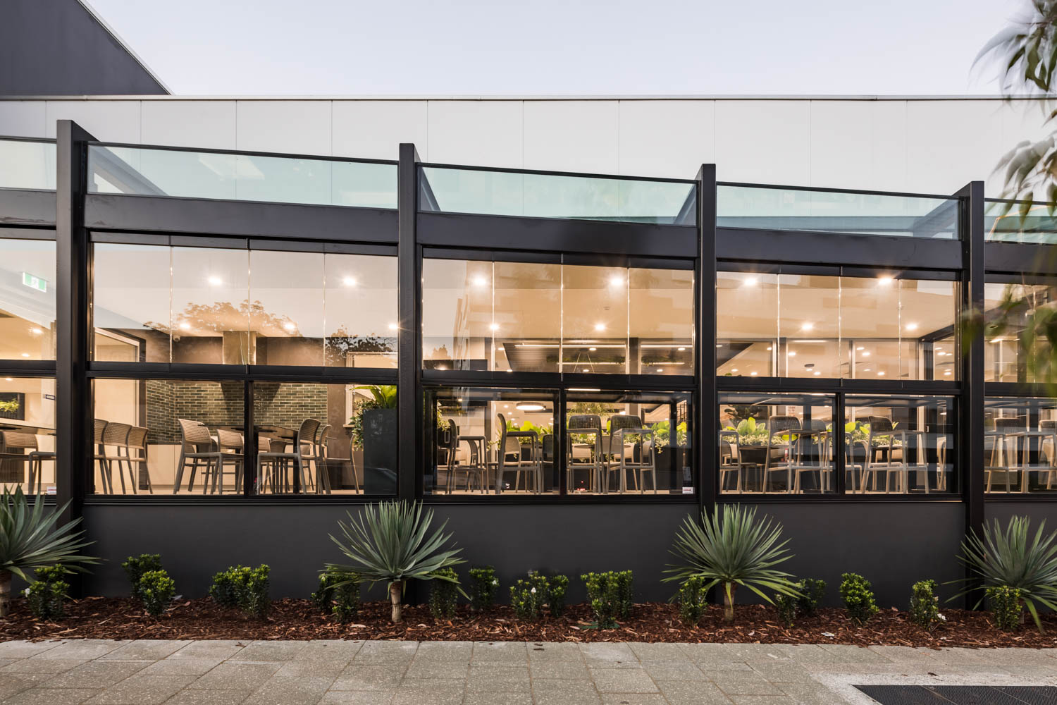 Integrating stacking glass windows with balustrades: Homegroup, Perth
