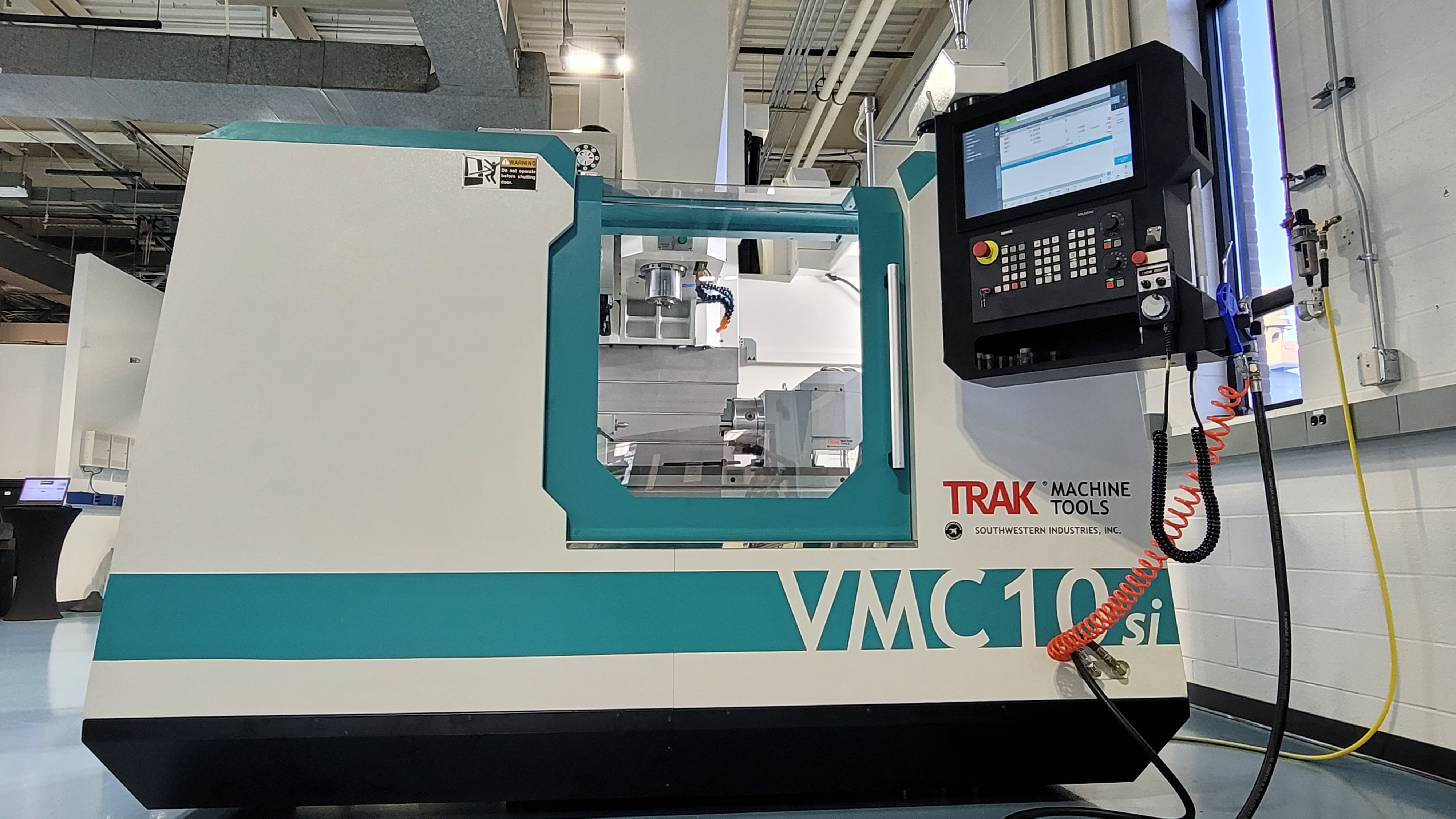 TRAK Machine Tools and Connecticut Center for Advanced Technology Sign ...