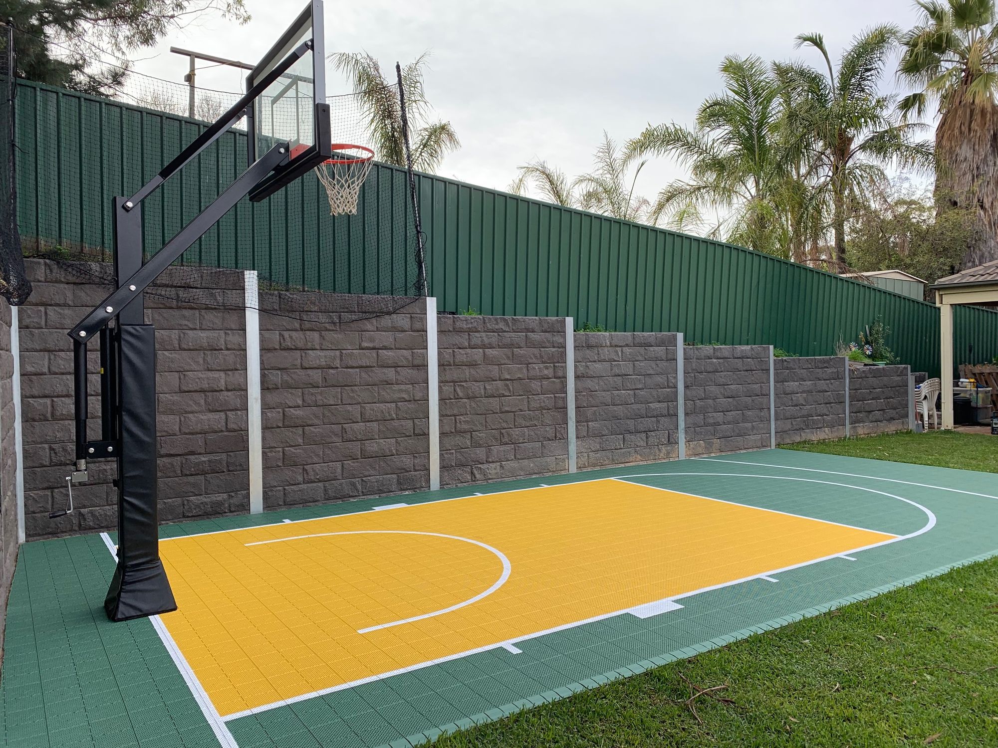 An Easy How-To Guide To Installing A Basketball Hoop | Dreamcourts™