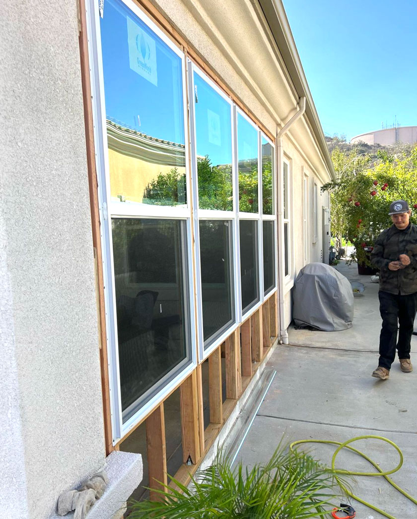 Duel Pane Windows and Custom Patio Wall - Iron Hands Construction