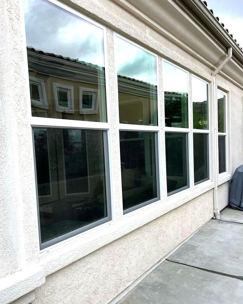 Duel Pane Windows and Custom Patio Wall - Iron Hands Construction