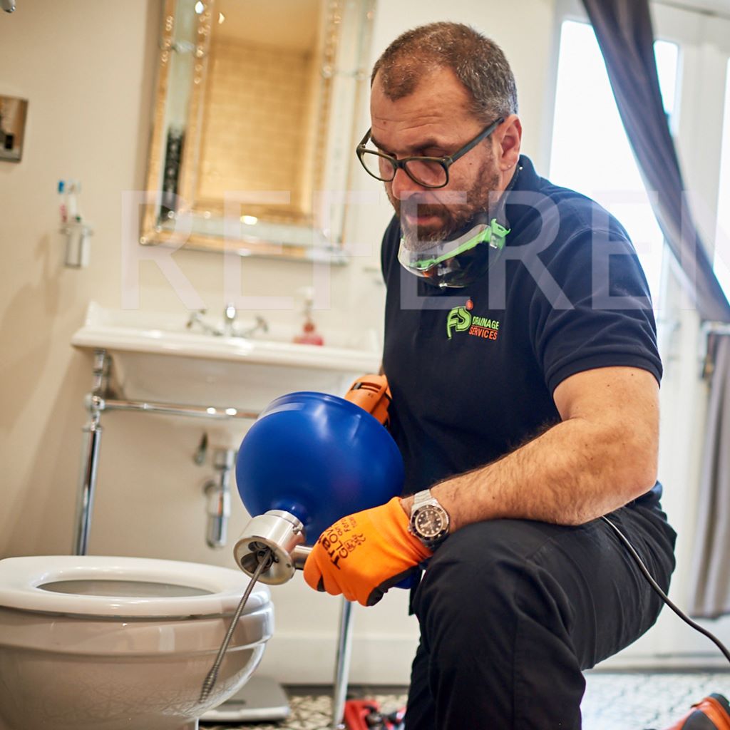 How to Use a Snake Drain: DIY Tips - FS Drainage