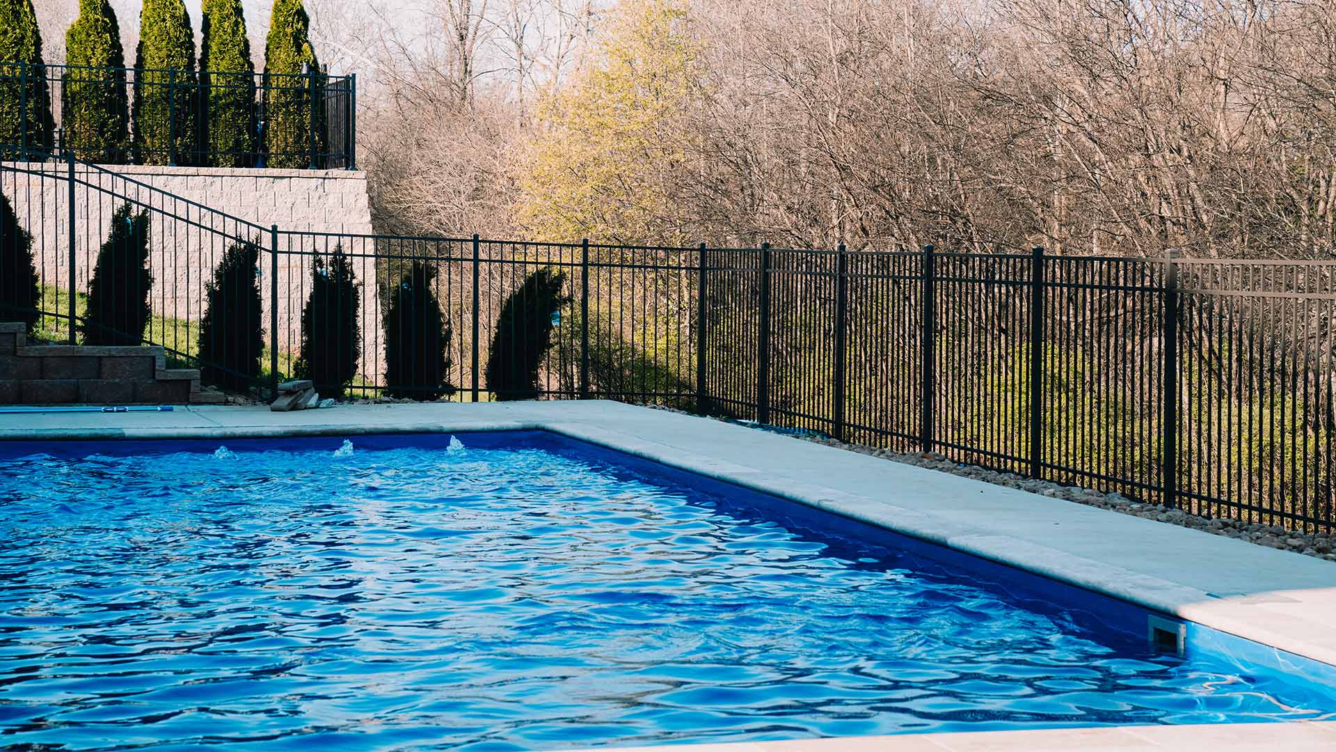 LC Fence Blog - What is the Best Fence to Put Around an Inground Pool?